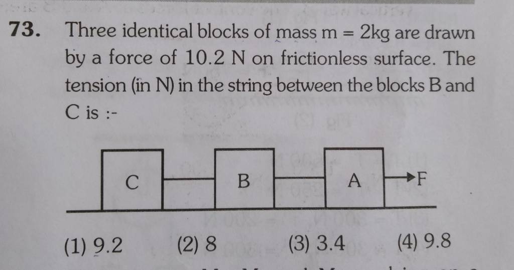 Three identical blocks of mass m=2kg are drawn by a force of 10.2mathrm N..