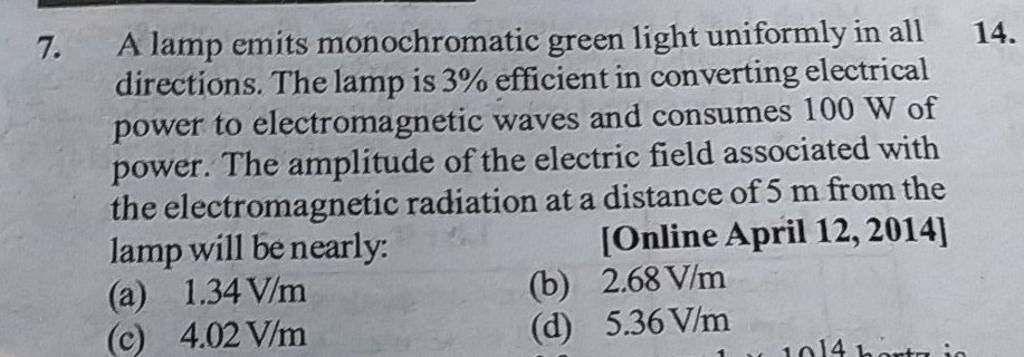 A lamp emits monochromatic green light uniformly in all directions. The l..