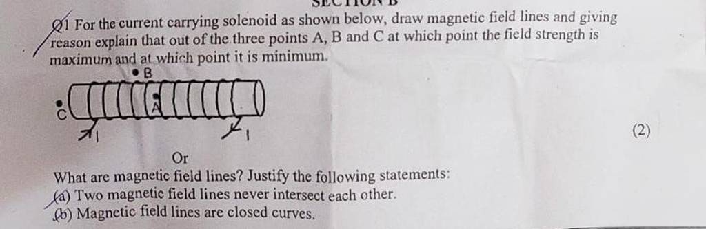 Q1 For the current carrying solenoid as shown below, draw magnetic field