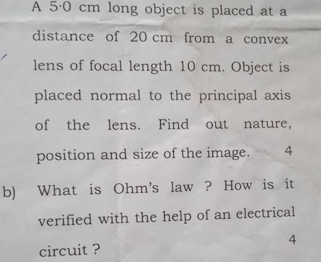 A 5.0 cm long object is placed at a distance of 20 cm from a convex lens
