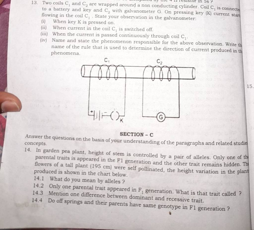 Two coils C1 and C2 are wrapped around a non conducting cylinder. Coil