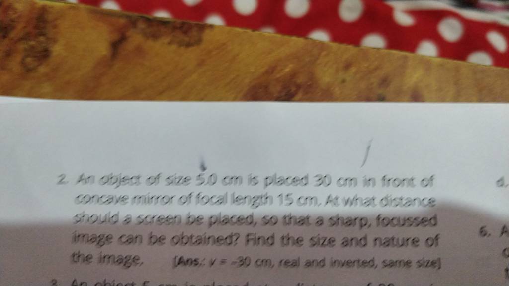 2. An object of size 50 cm is placed 30 cm in front of concave mirror of