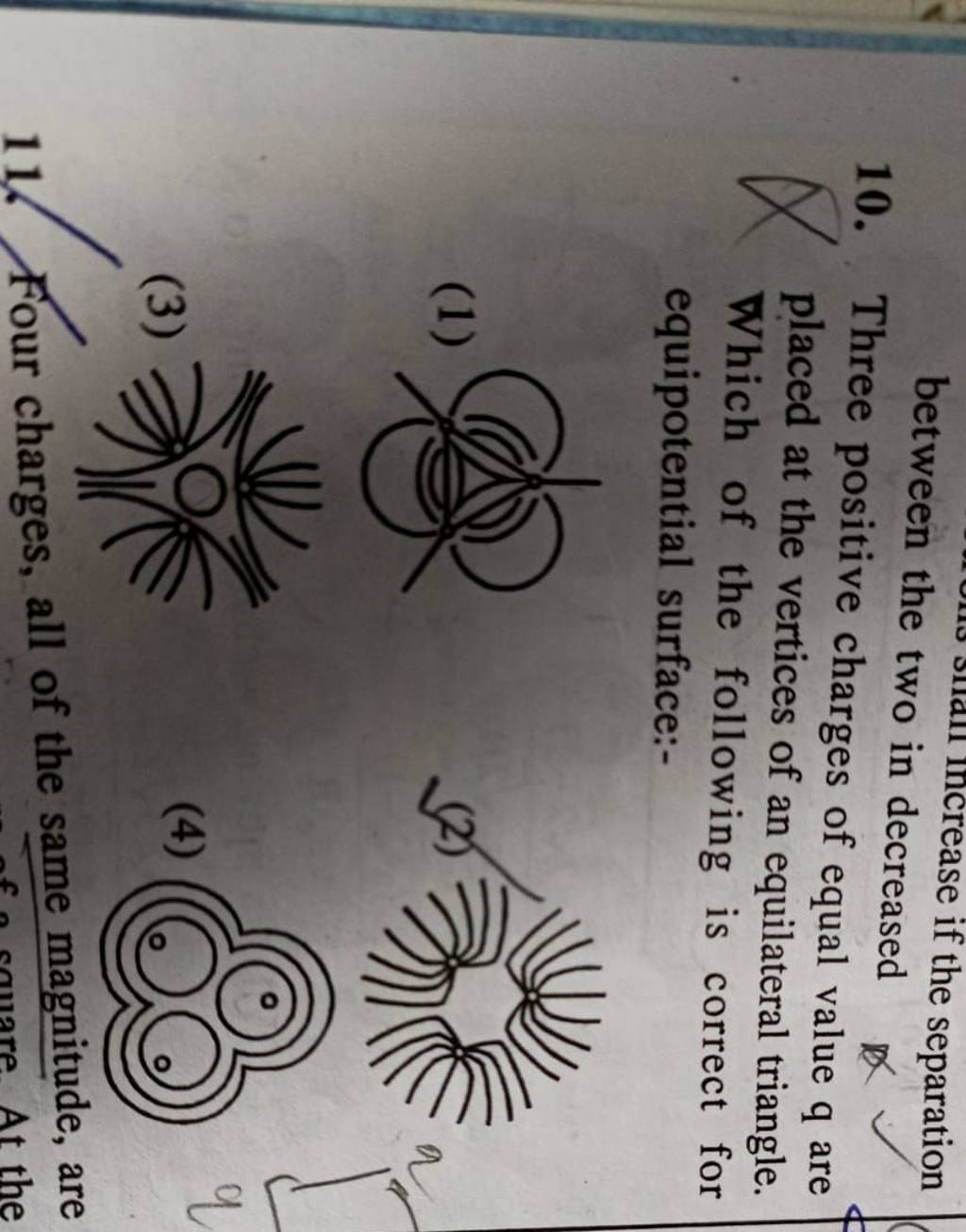 Three positive charges of equal value q are placed at the vertices of an