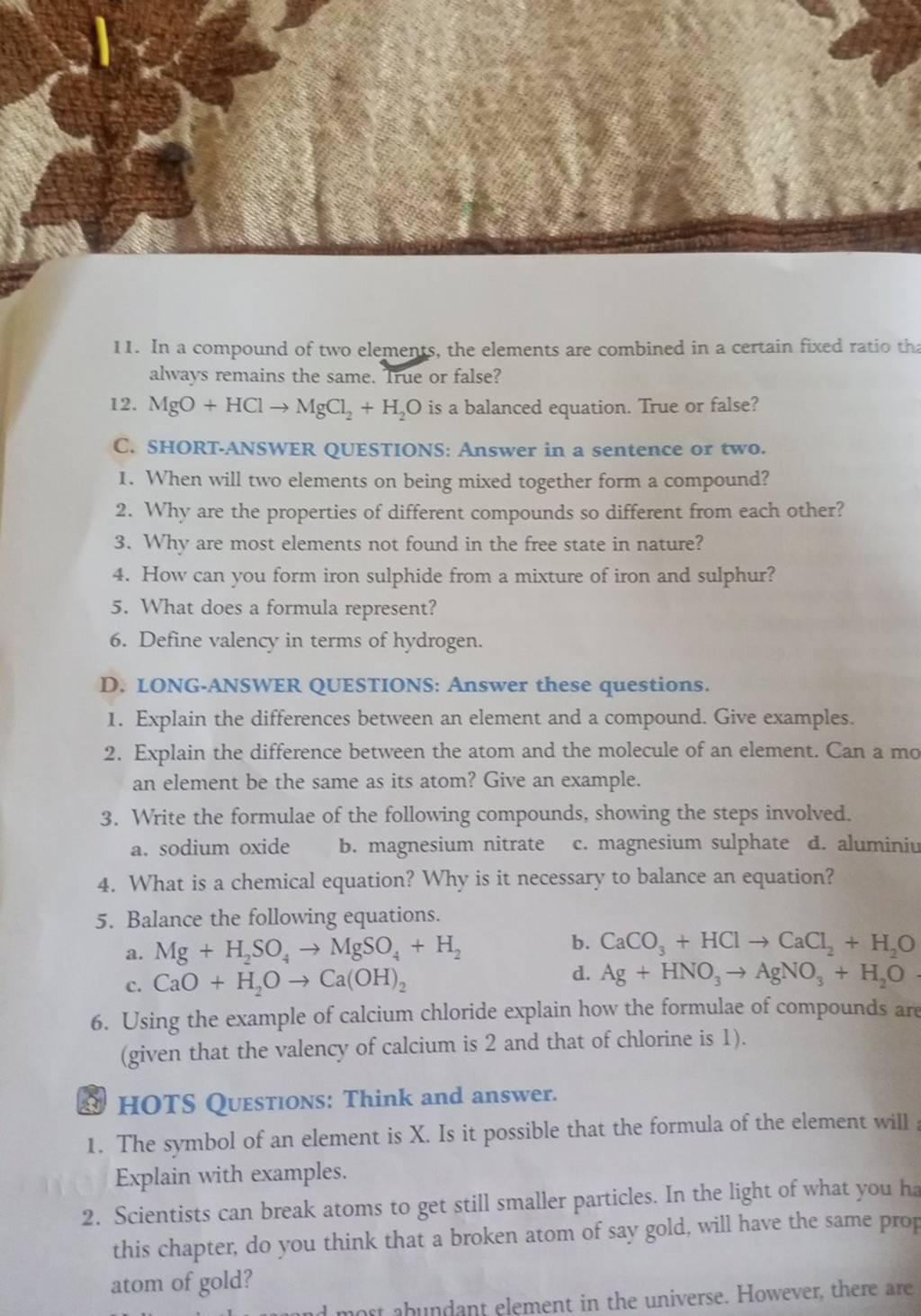 Explain the differences between an element and a compound. Give examples...