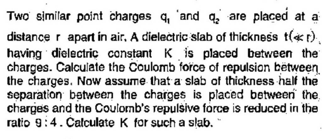 Two similar point charges q1 and q2 are placed at a distance r apart in..