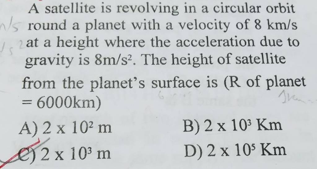 A satellite is revolving in a circular orbit round a planet with a veloci..