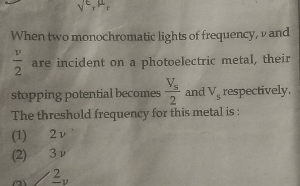 When two monochromatic lights of frequency, v and 2ν are incident on a p..