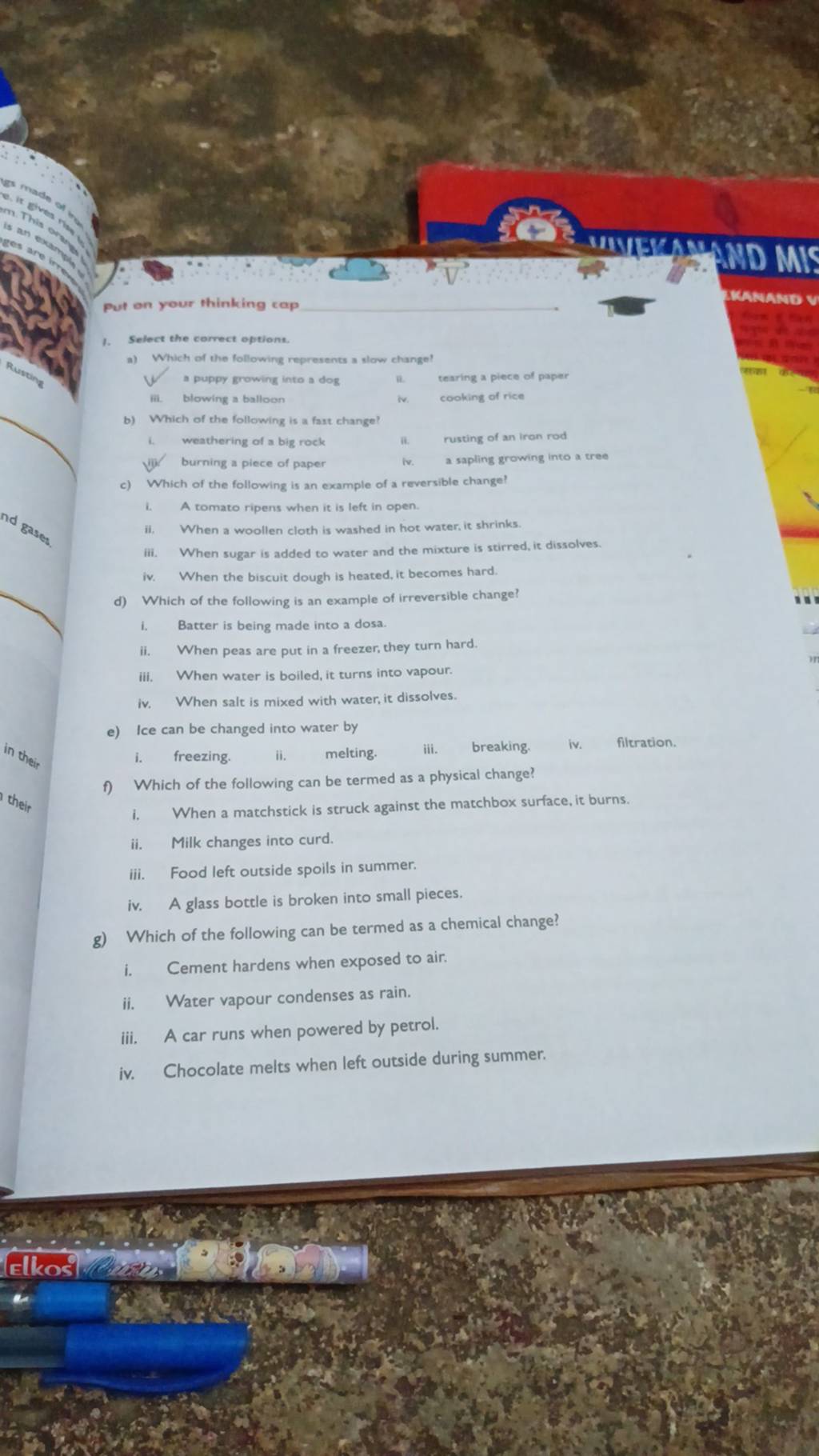 rusting of an iron rod Vi0. burning a piece of paper a sapling growing in..