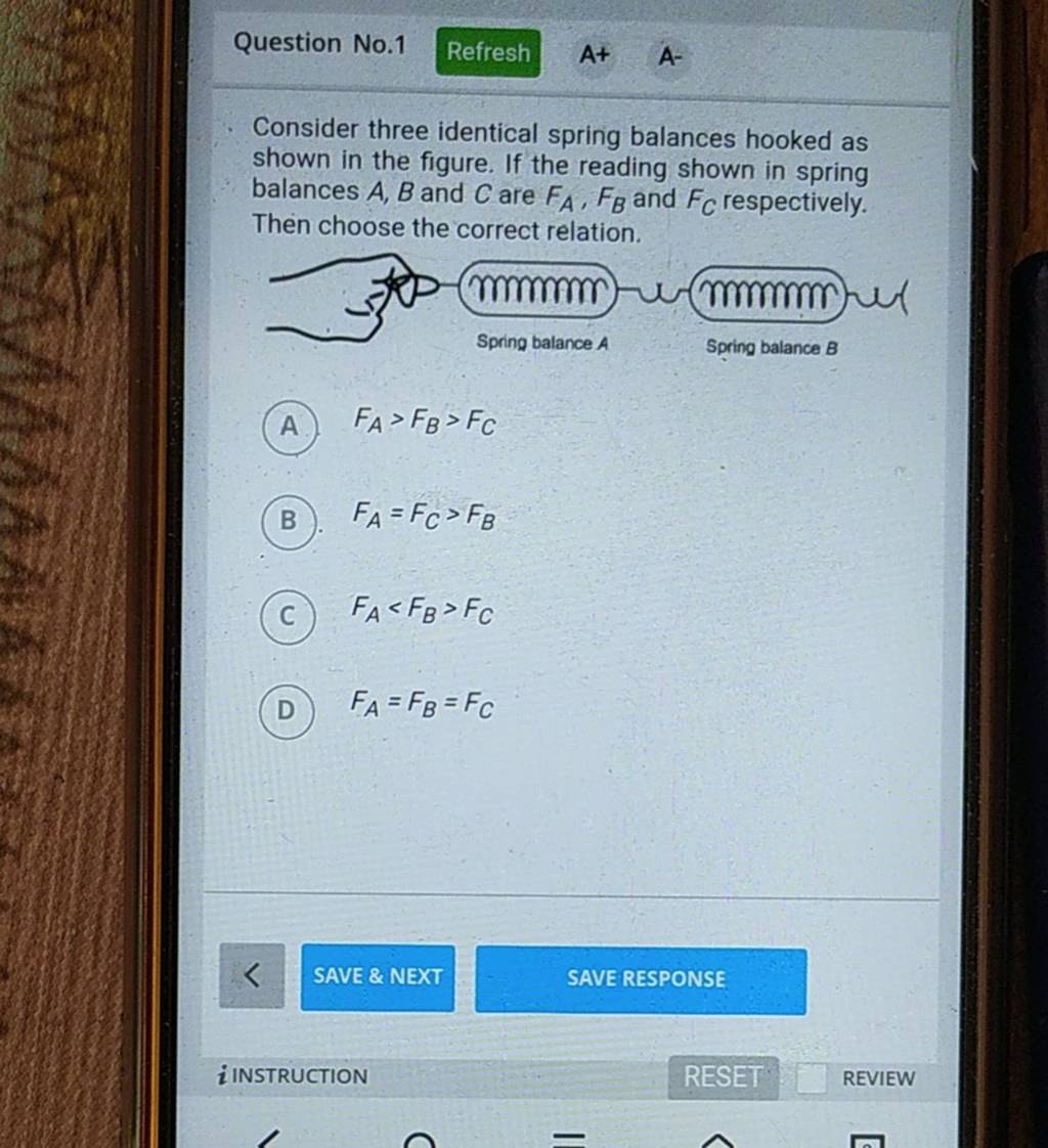 Consider three identical spring balances hooked as shown in the figure. I..