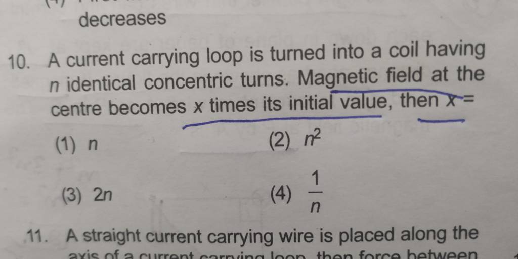 A current carrying loop is turned into a coil having n identical concentr..