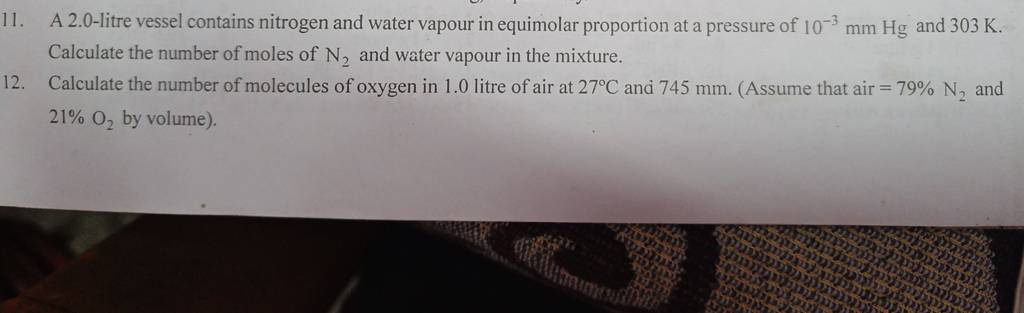 11. A 2.0-litre vessel contains nitrogen and water vapour in equimolar pr..
