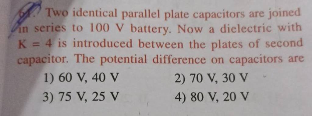 Two identical parallel plate capacitors are joined In series to 100 V bat..