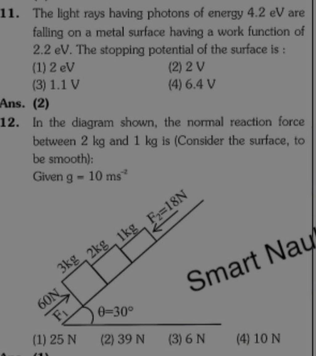 (2) 12. In the diagram shown, the normal reaction force between 2 kg and