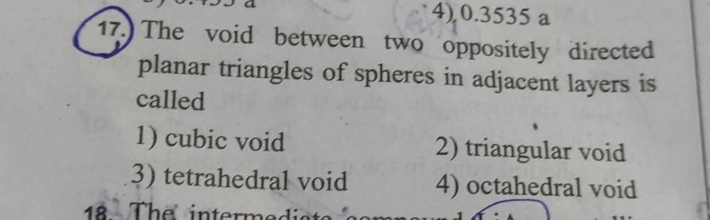 The void between two oppositely directed planar triangles of spheres in a..