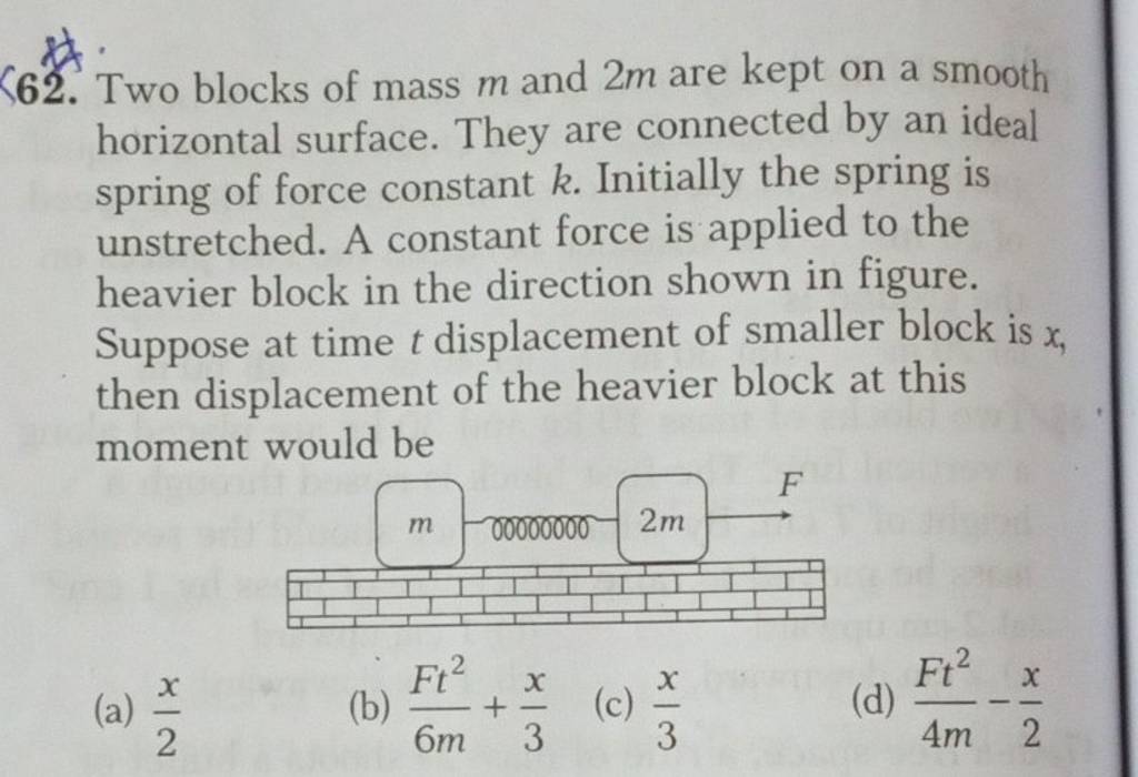 Two blocks of mass m and 2m are kept on a smooth horizontal surface. They..