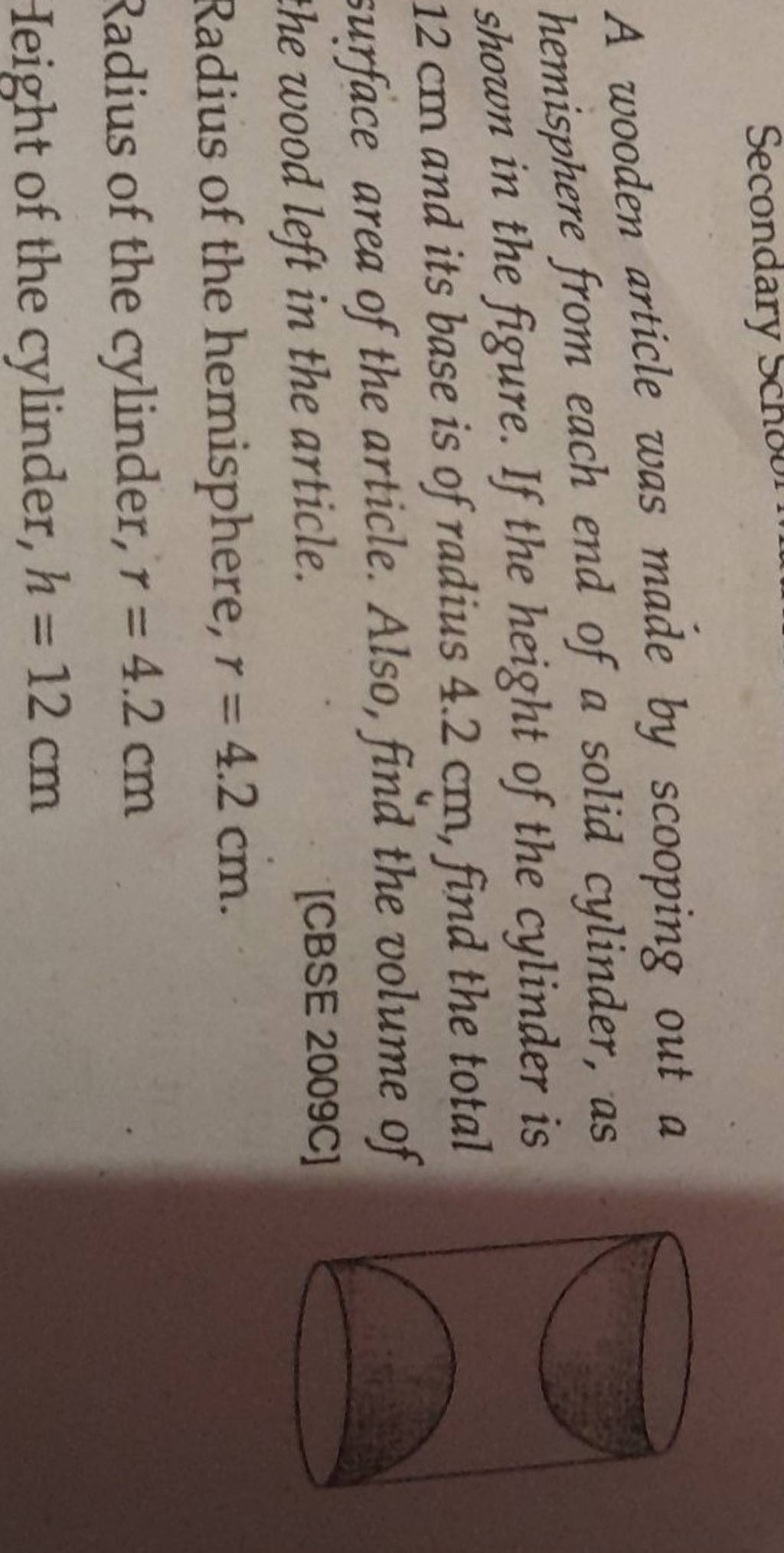 A wooden article was made by scooping out a hemisphere from each end of a..