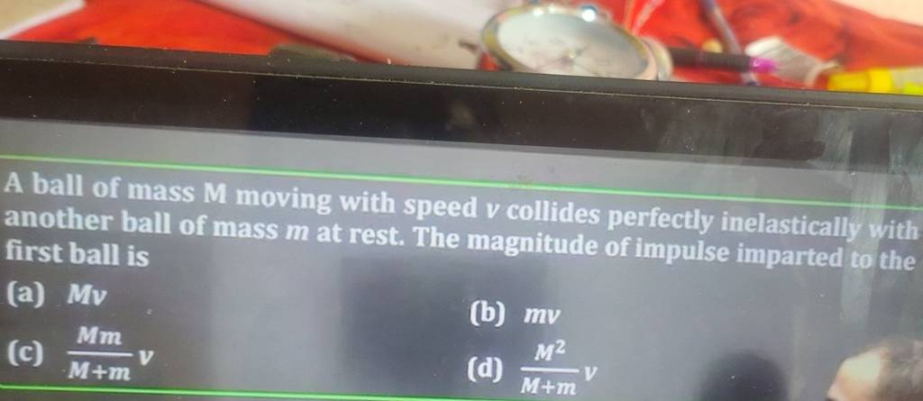 A ball of mass M moving with speed v collides perfectly inelastically wit..