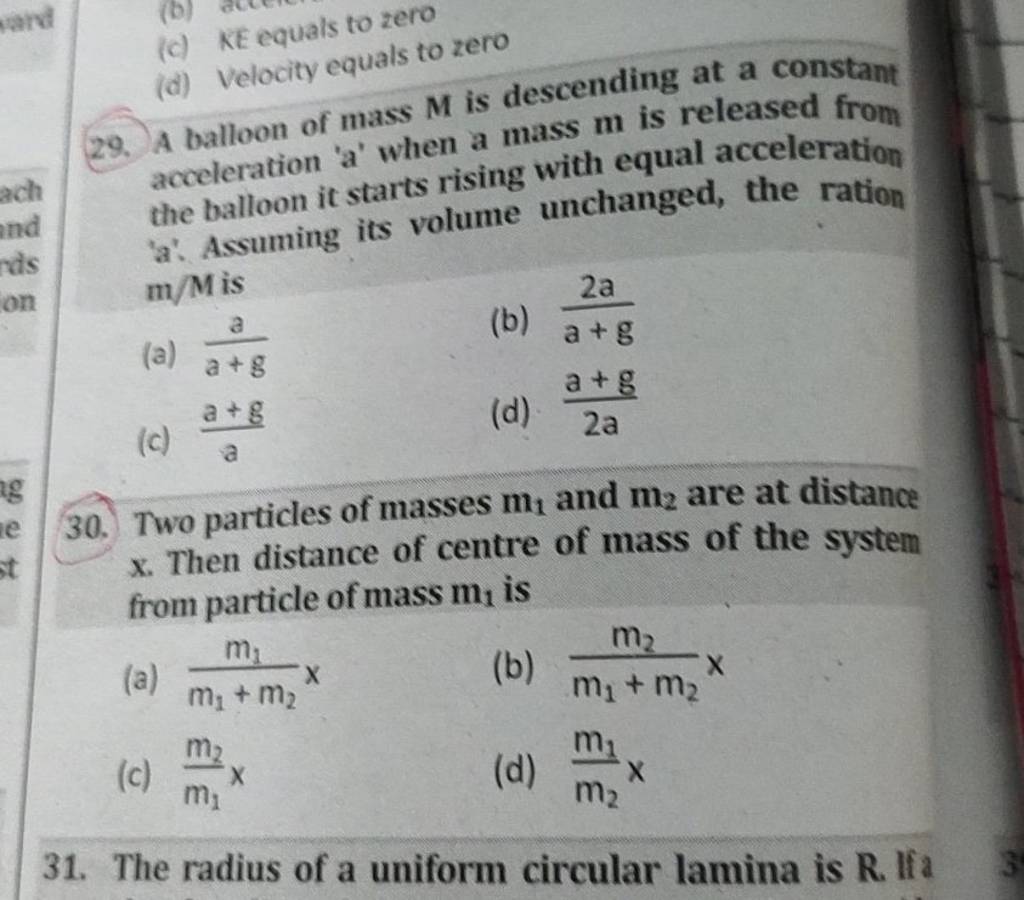 Two particles of masses m1 and m2 are at distance x. Then distance of c..