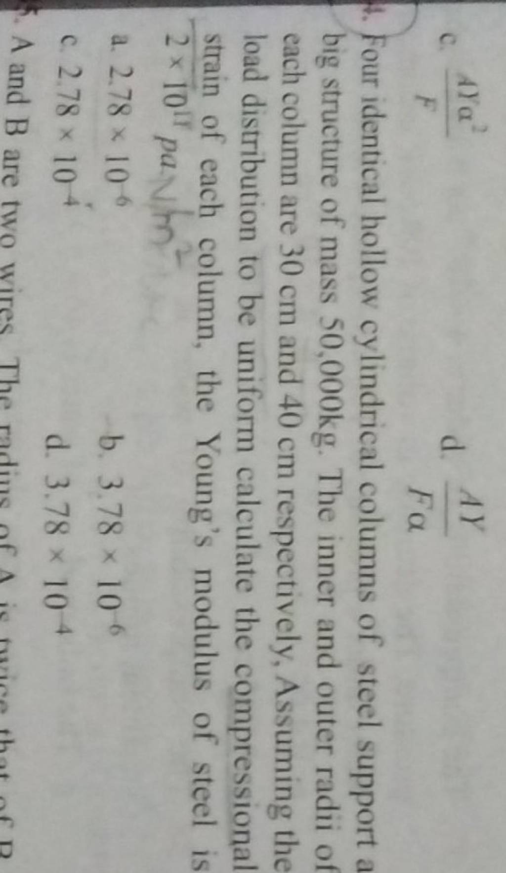 Four identical hollow cylindrical columns of steel support a big structur..