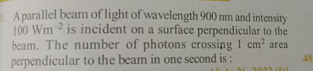 A parallel beam of light of wavelength 900 nm and intensity 100Wm−2 is in..