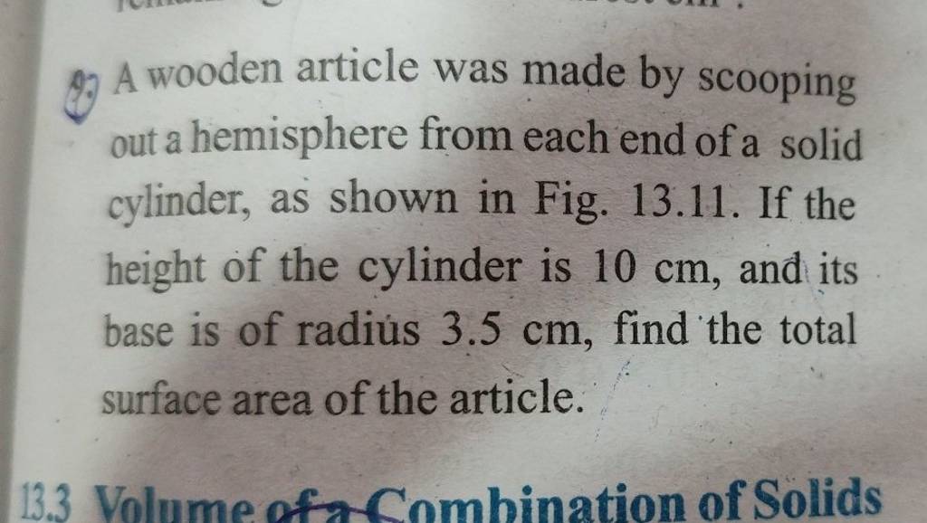 Q3. A wooden article was made by scooping out a hemisphere from each end