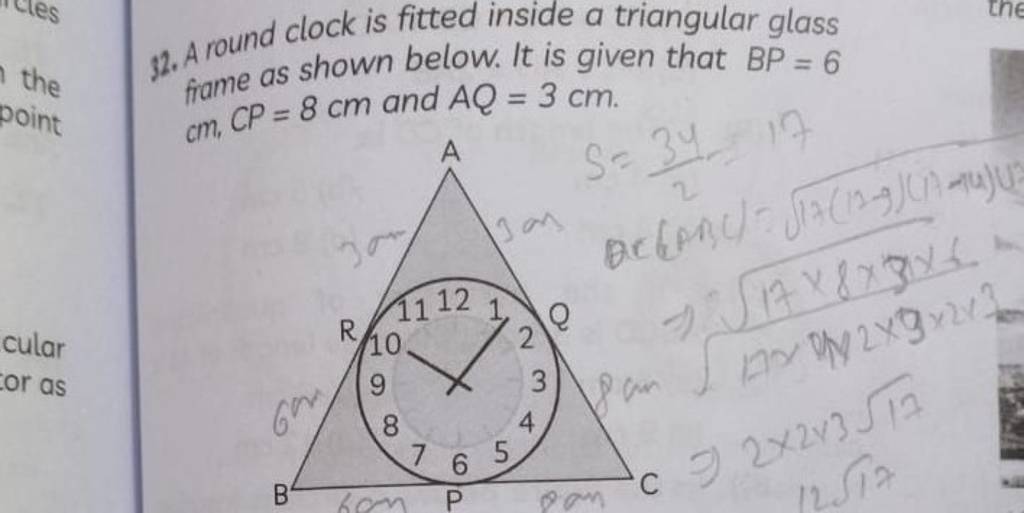 32. A round clock is fitted inside a triangular glass frame as shown belo.. 32. A round clock is fitted inside a triangular glass frame as shown belo..