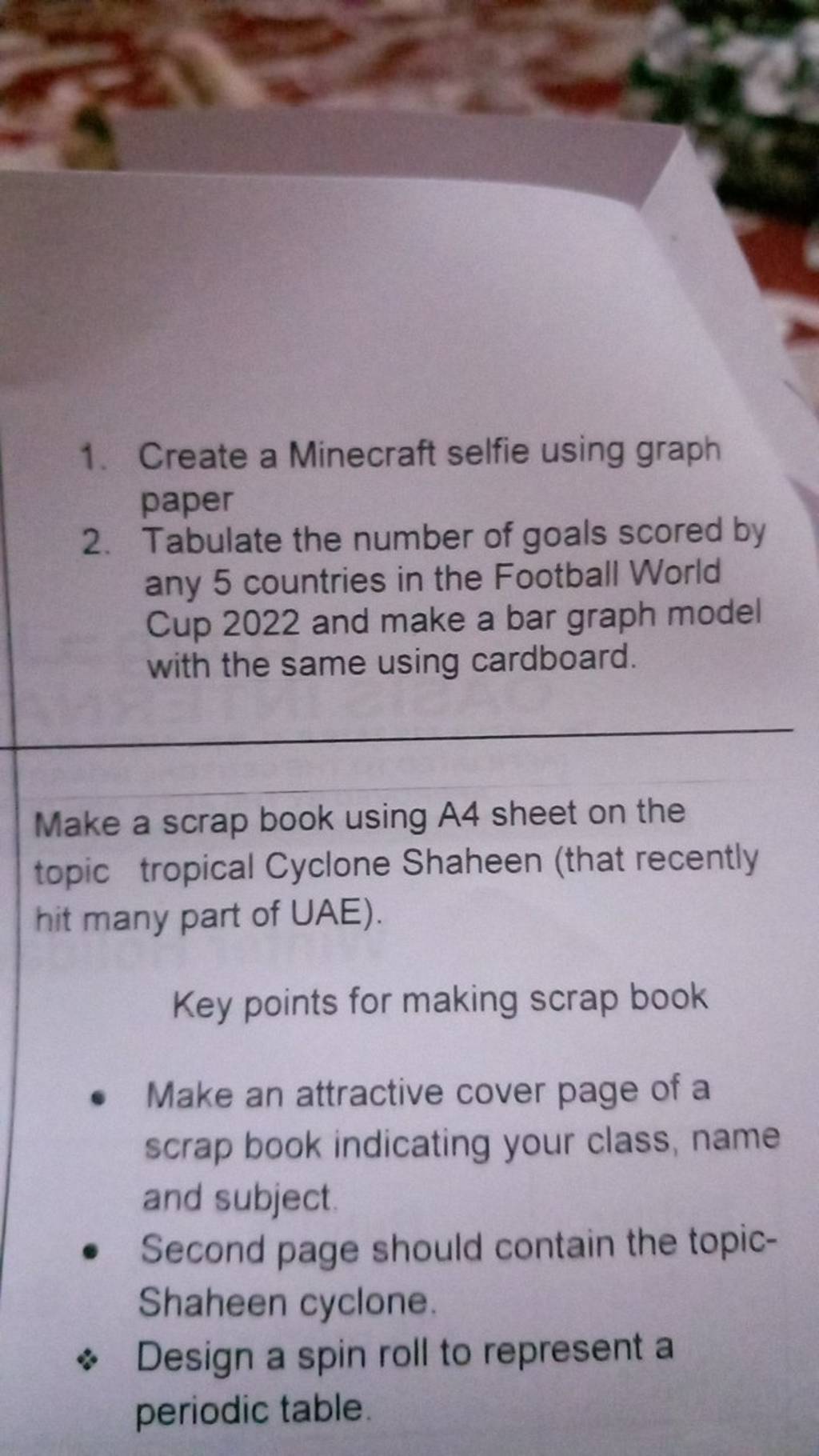 1. Create a Minecraft selfie using graph paper 2. Tabulate the number of