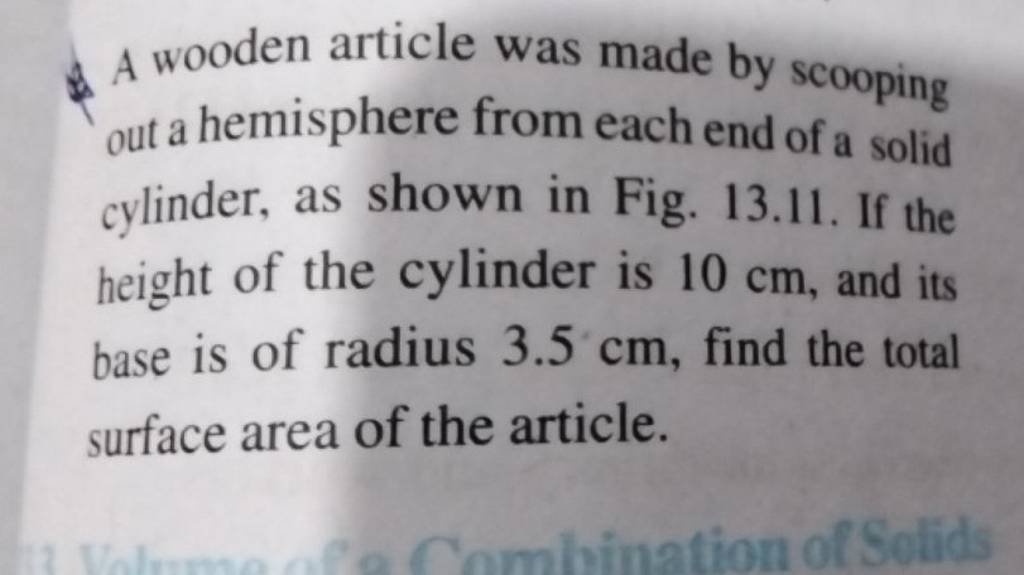 A wooden article was made by scooping out a hemisphere from each end of a..