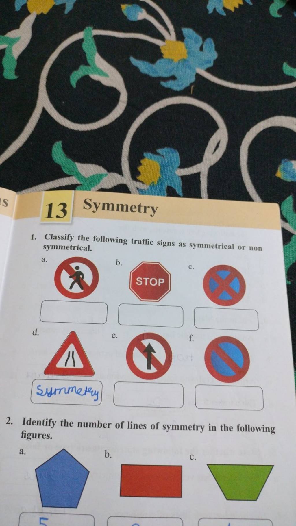 Symmetry 13 1. Classify the following traffic signs as symmetrical or non..