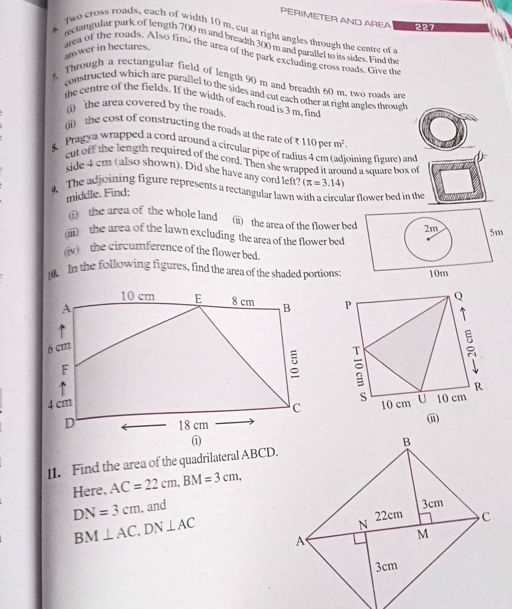 Two cross roads, each of width 10 m, cut at right angles through the cent..
