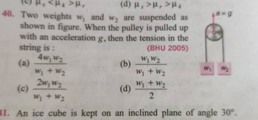 40. Two weights w1 and w2 are suspended as shown in figure. When the pu..
