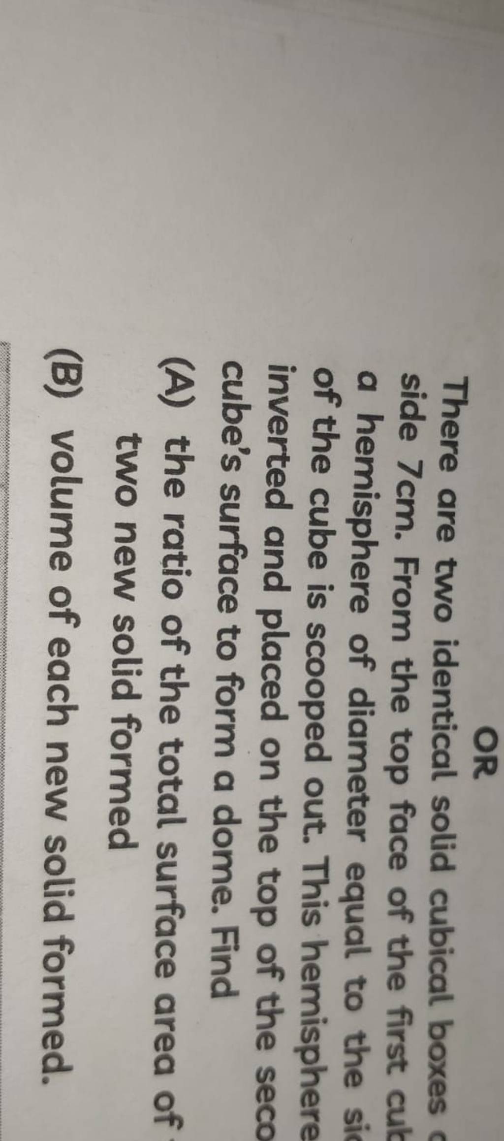 OR There are two identical solid cubical boxes side 7 cm. From the top fa..