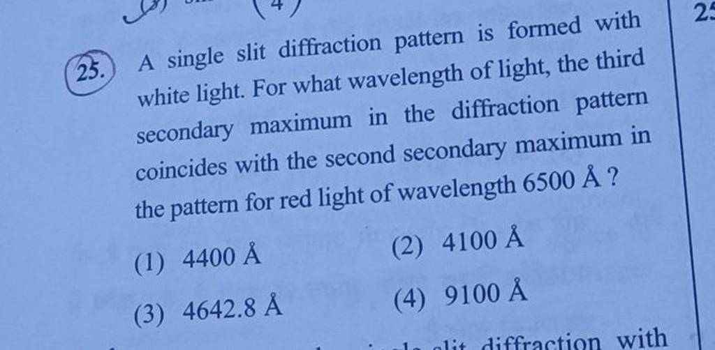 A single slit diffraction pattern is formed with white light. For what wa..