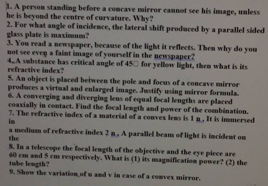 1. A person standing before a concave mirror cannot see his image, unless..