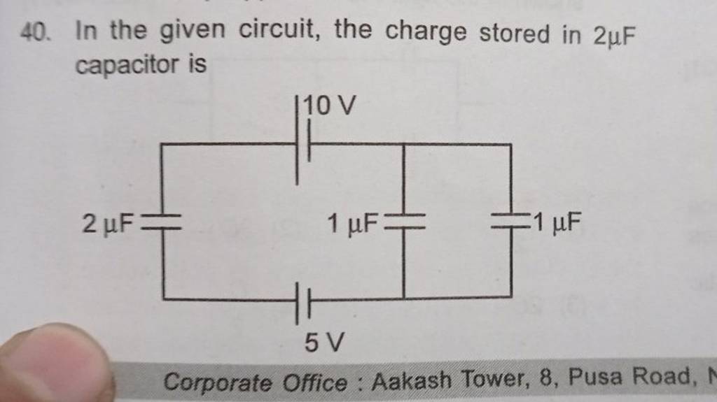 40. In the given circuit, the charge stored in 2μF capacitor is Corporate..