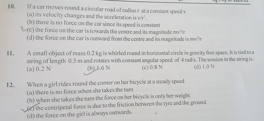 If a car moves round a circular road of radius r at a constant speed v..