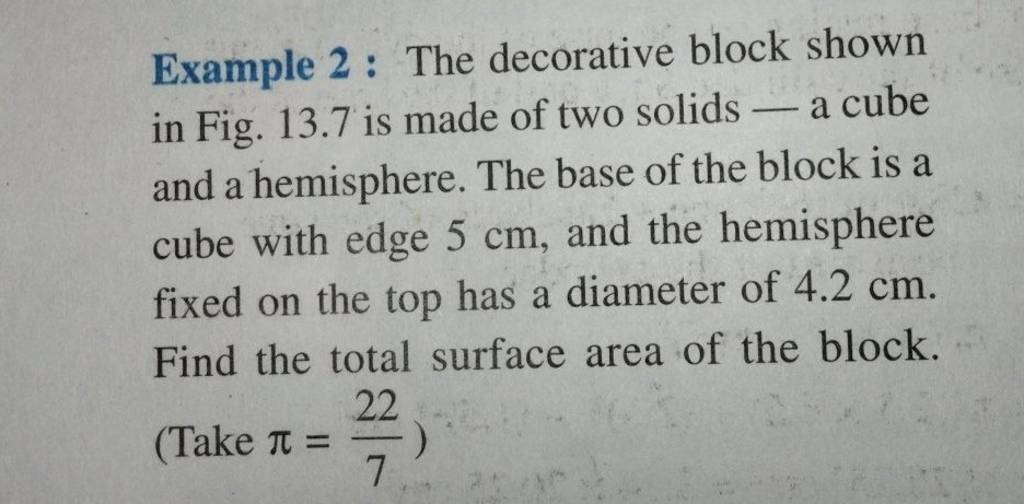 Example 2 : The decorative block shown in Fig. 13.7 is made of two solids..