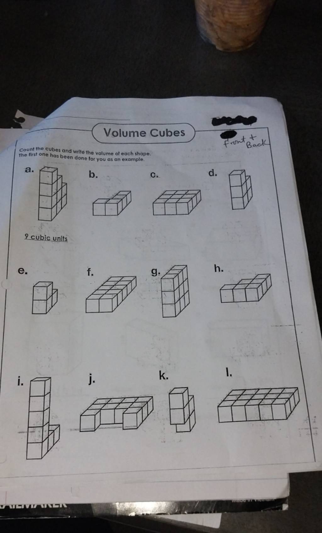 Count the cubes and write the volume of each shape. The first one has bee..