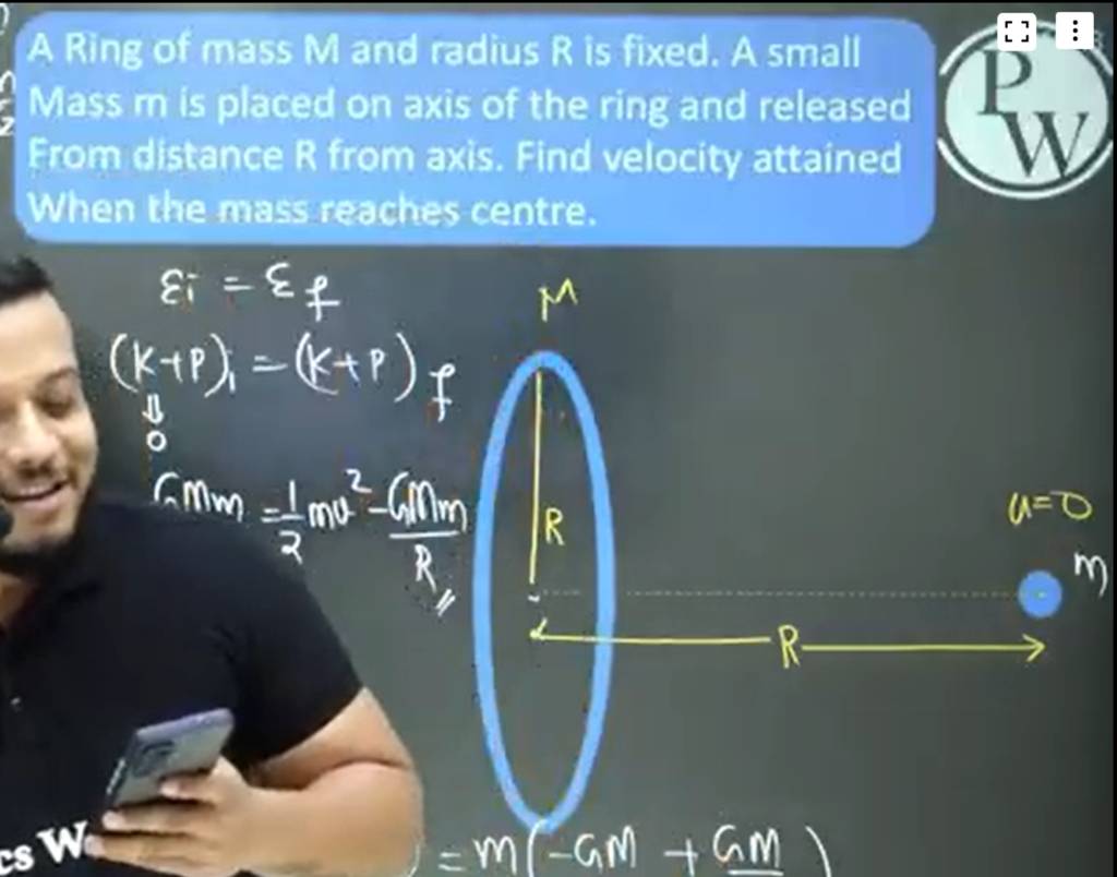 A Ring of mass M and radius R is fixed. A small Mass m is placed on axis