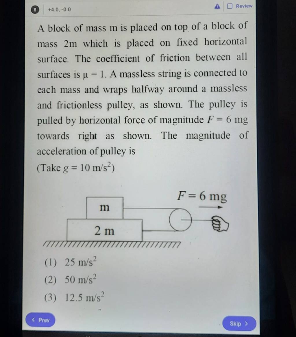 A block of mass m is placed on top of a block of mass 2 m which is placed..
