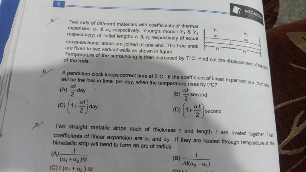 5. Two rods of different materials with coefficients of thermal expansion..