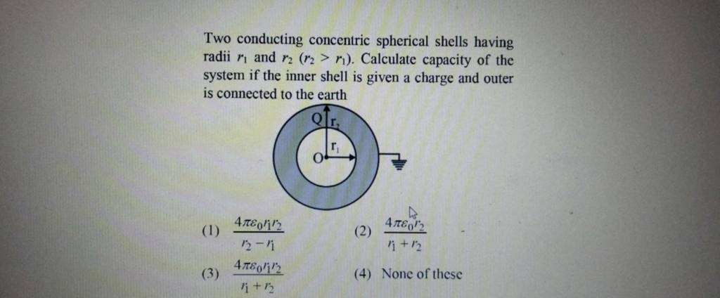 Two conducting concentric spherical shells having radii r1 and r2 (r2 >r..