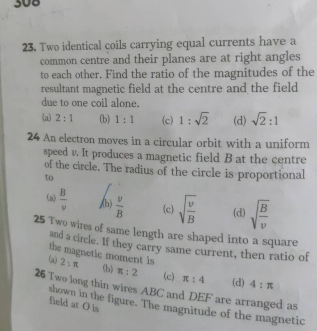 Two identical coils carrying equal currents have a common centre and thei.. Two identical coils carrying equal currents have a common centre and thei..
