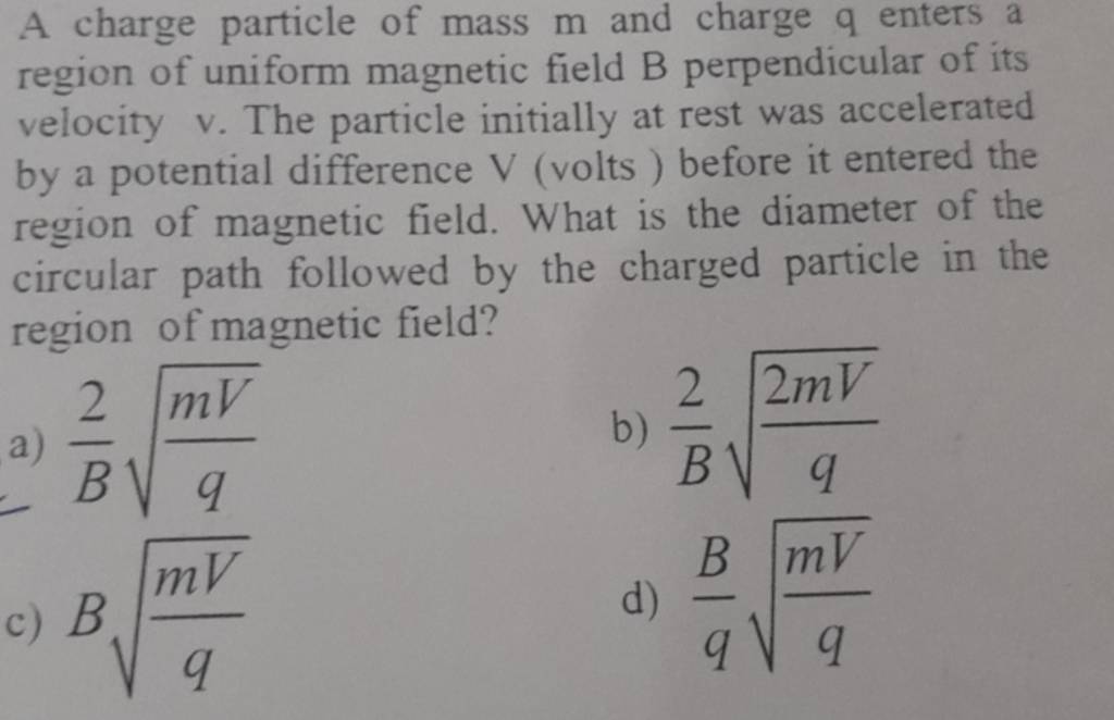 A charge particle of mass m and charge q enters a region of uniform magne..