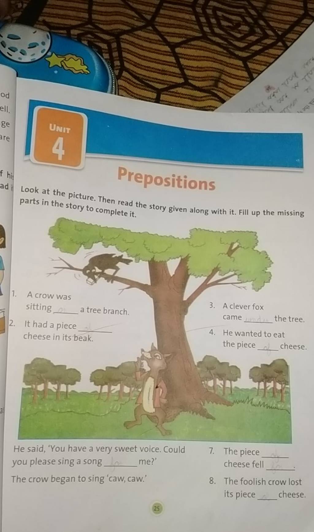 Prepositions Look at the picture. Then read the story given along with it..