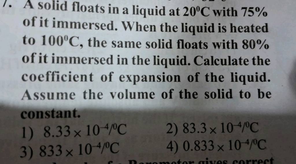 A solid floats in a liquid at 20∘C with 75% of it immersed. When the liqu..