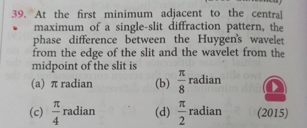 At the first minimum adjacent to the central maximum of a single-slit dif..