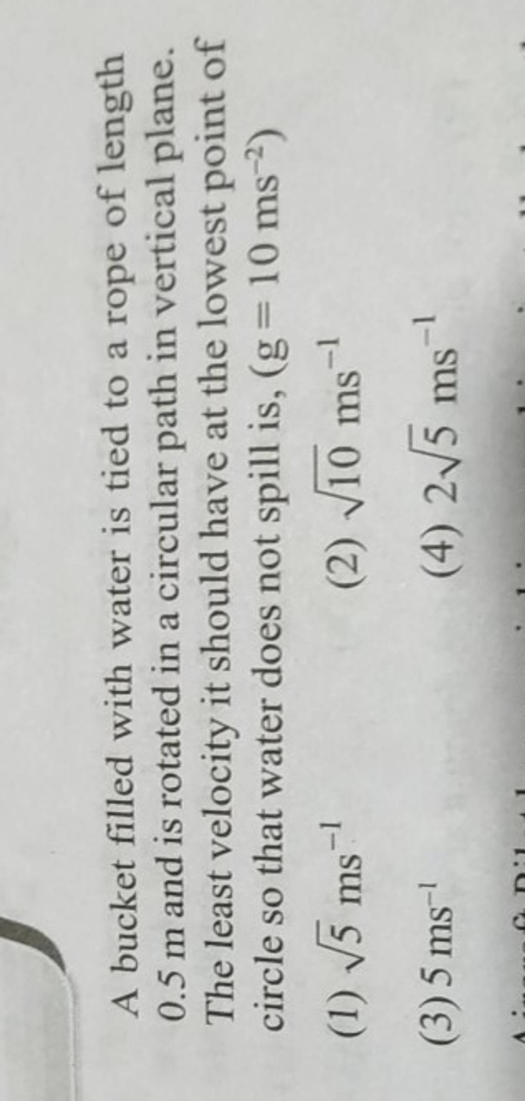 A bucket filled with water is tied to a rope of length 0.5 m and is rotat..
