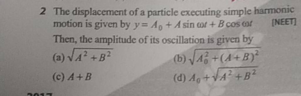 2 The displacement of a particle executing simple harmonic motion is give..